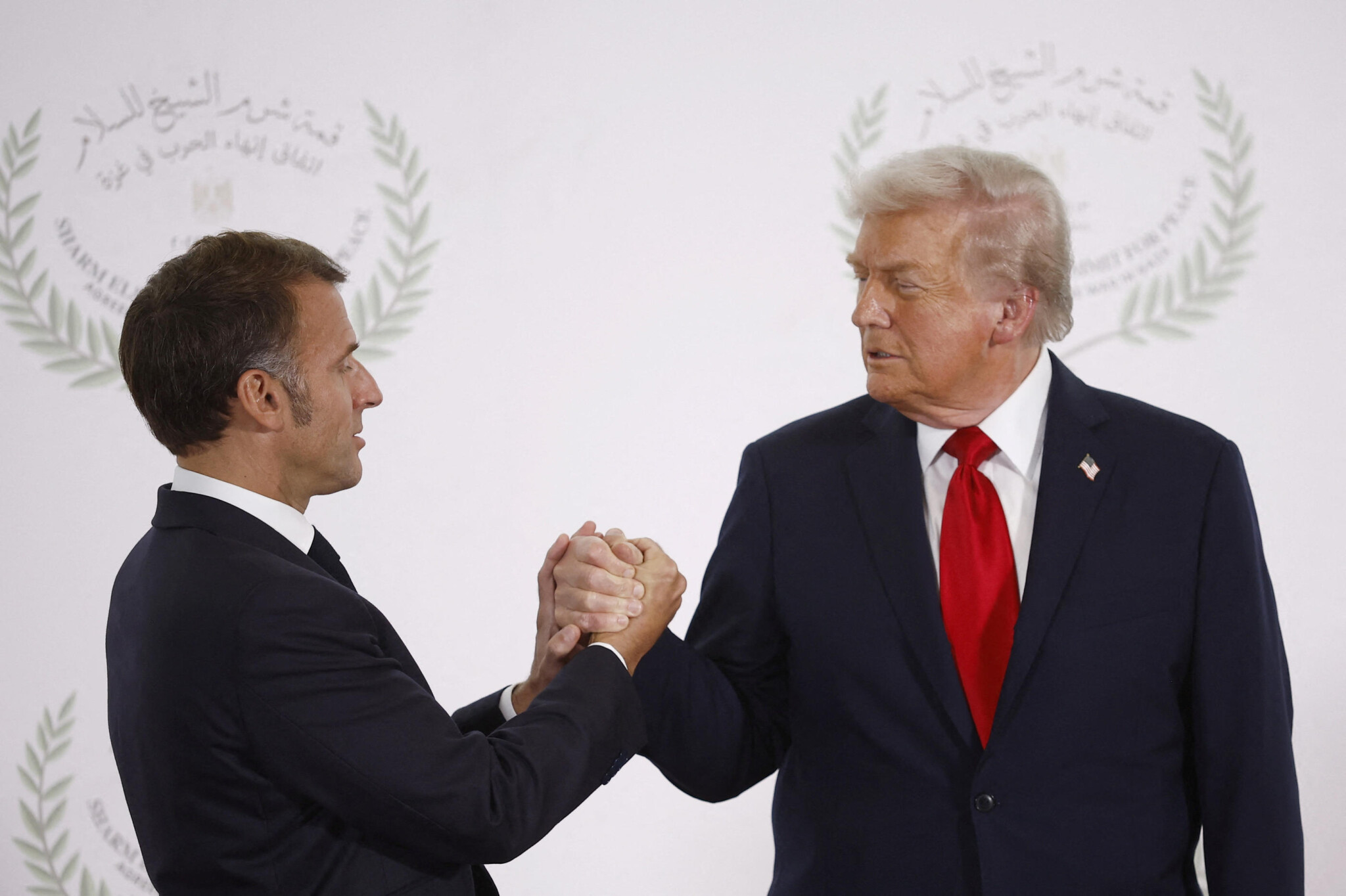 Trump-Macron handshake goes viral: Awkward tension revealed