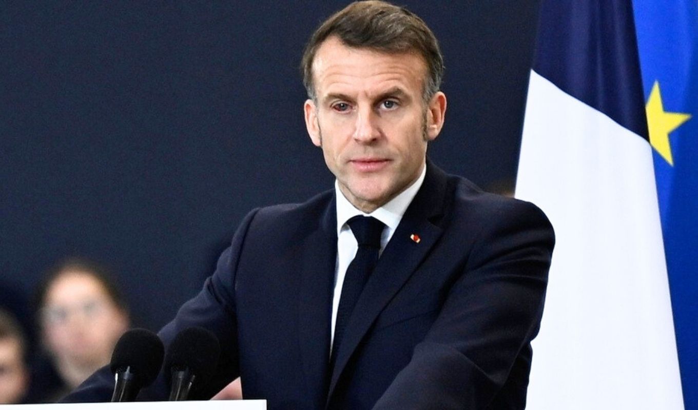 Macron inspects French troops with red eye, jokes about "Eye of the Tiger"